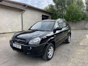 Black Hyundai Tucson 2008 in Telschi, with an engine capacity of 1.98 L and mileage of 245 thousand km for 2750 €, photo  on AUTOMOTO.COM.LV