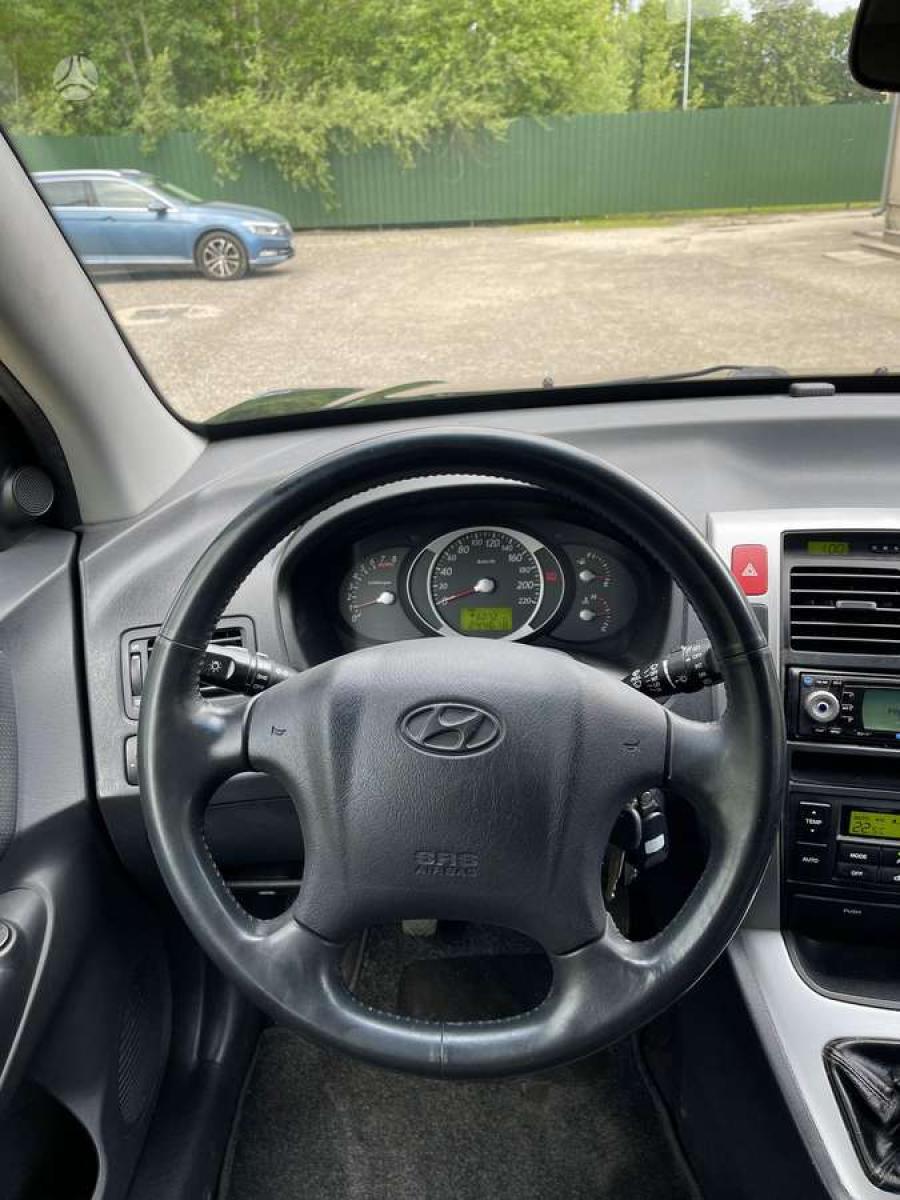 Black Hyundai Tucson 2008 in Telschi, with an engine capacity of 1.98 L and mileage of 245 thousand km for 2750 €, photo 25 on AUTOMOTO.COM.LV