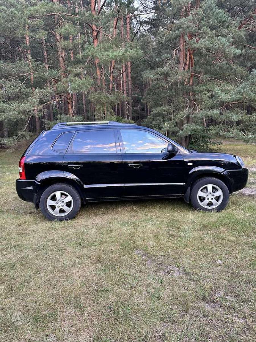 Melns Hyundai Tucson 2008 Kauņa, ar dzinēja tilpumu 1.99 L un nobraukumu 154 tūkst. km par 3500 €, foto 13 vietnē AUTOMOTO.COM.LV