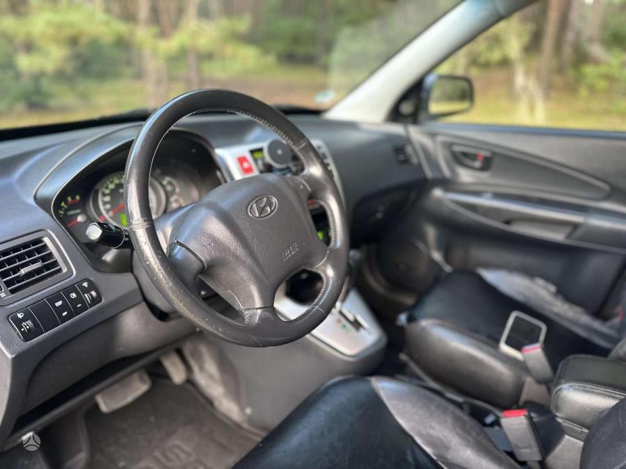 Melns Hyundai Tucson 2008 Kauņa, ar dzinēja tilpumu 1.99 L un nobraukumu 154 tūkst. km par 3500 €, foto 18 vietnē AUTOMOTO.COM.LV
