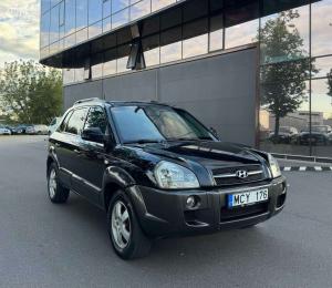 Black Hyundai Tucson 2008 in Vilnius, with an engine capacity of 2.00 L and mileage of 309 thousand km for 1799 €, photo 3 on AUTOMOTO.COM.LV