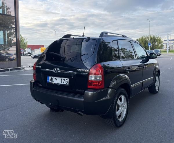 Melns Hyundai Tucson 2008 Viļņa, ar dzinēja tilpumu 2.00 L un nobraukumu 309 tūkst. km par 1799 €, foto 5 vietnē AUTOMOTO.COM.LV