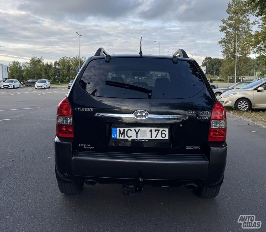 Black Hyundai Tucson 2008 in Vilnius, with an engine capacity of 2.00 L and mileage of 309 thousand km for 1799 €, photo 6 on AUTOMOTO.COM.LV