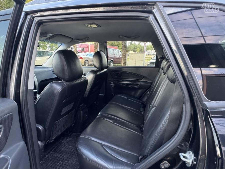 Black Hyundai Tucson 2008 in Vilnius, with an engine capacity of 2.00 L and mileage of 309 thousand km for 1799 €, photo 7 on AUTOMOTO.COM.LV