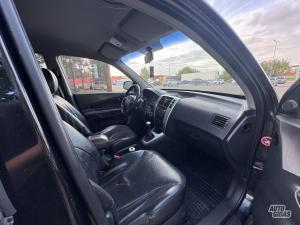 Black Hyundai Tucson 2008 in Vilnius, with an engine capacity of 2.00 L and mileage of 309 thousand km for 1799 €, photo 11 on AUTOMOTO.COM.LV