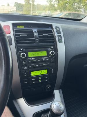 Black Hyundai Tucson 2008 in Vilnius, with an engine capacity of 2.00 L and mileage of 309 thousand km for 1799 €, photo 14 on AUTOMOTO.COM.LV