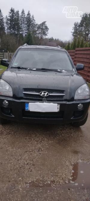 Black Hyundai Tucson 2009 in Utena, with an engine capacity of 2.00 L and mileage of 230 thousand km for 3100 €, photo  on AUTOMOTO.COM.LV