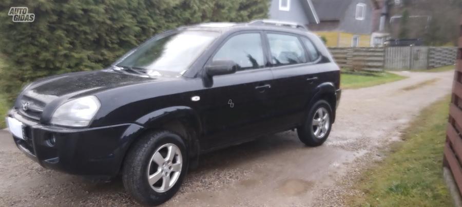 Black Hyundai Tucson 2009 in Utena, with an engine capacity of 2.00 L and mileage of 230 thousand km for 3100 €, photo 5 on AUTOMOTO.COM.LV