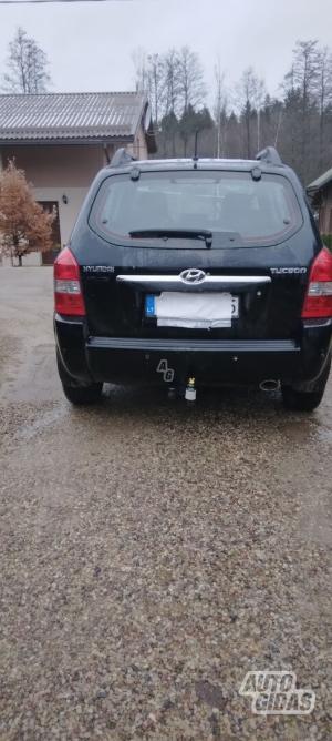 Black Hyundai Tucson 2009 in Utena, with an engine capacity of 2.00 L and mileage of 230 thousand km for 3100 €, photo 7 on AUTOMOTO.COM.LV