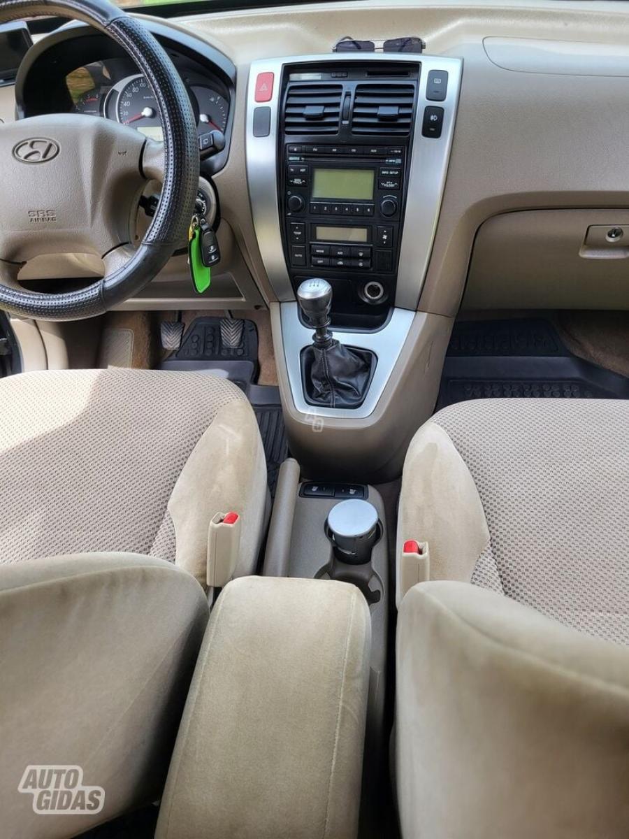 Melns Hyundai Tucson 2009 Zarasai, ar dzinēja tilpumu 2.00 L un nobraukumu 278 tūkst. km par 3700 €, foto 6 vietnē AUTOMOTO.COM.LV
