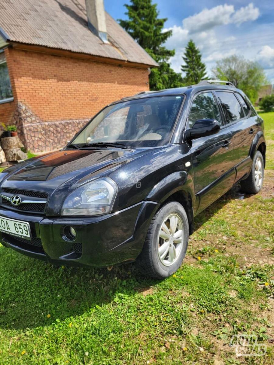 Melns Hyundai Tucson 2009 Zarasai, ar dzinēja tilpumu 2.00 L un nobraukumu 278 tūkst. km par 3700 €, foto 11 vietnē AUTOMOTO.COM.LV