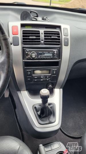Black Hyundai Tucson 2009 in Vilnius, with an engine capacity of 2.00 L and mileage of 130 thousand km for 2750 €, photo 15 on AUTOMOTO.COM.LV