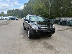 Black Hyundai Tucson 2009 in Riga, with an engine capacity of 2.00 L and mileage of 0 thousand km for 4300 €, photo  on AUTOMOTO.COM.LV