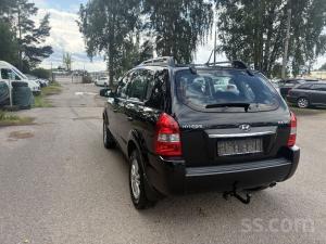 Black Hyundai Tucson 2009 in Riga, with an engine capacity of 2.00 L and mileage of 0 thousand km for 4300 €, photo 9 on AUTOMOTO.COM.LV