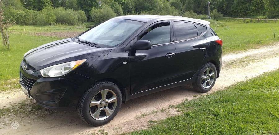 Melns Hyundai Tucson 2012 Viļņa, ar dzinēja tilpumu 2.00 L un nobraukumu 225 tūkst. km par 4440 €, foto 6 vietnē AUTOMOTO.COM.LV