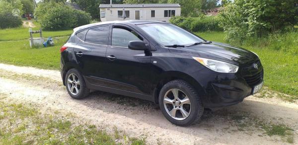 Melns Hyundai Tucson 2012 Viļņa, ar dzinēja tilpumu 2.00 L un nobraukumu 225 tūkst. km par 4440 €, foto 6 vietnē AUTOMOTO.COM.LV