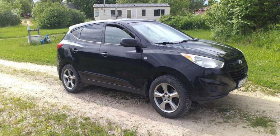 Melns Hyundai Tucson 2012 Viļņa, ar dzinēja tilpumu 2.00 L un nobraukumu 225 tūkst. km par 4440 €, foto 7 vietnē AUTOMOTO.COM.LV