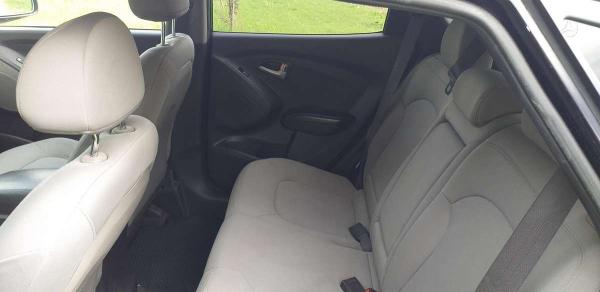 Melns Hyundai Tucson 2012 Viļņa, ar dzinēja tilpumu 2.00 L un nobraukumu 225 tūkst. km par 4440 €, foto 8 vietnē AUTOMOTO.COM.LV