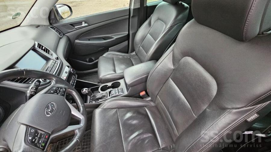 Black Hyundai Tucson 2016 in Riga, with an engine capacity of 1.60 L and mileage of 247 thousand km for 10500 €, photo 9 on AUTOMOTO.COM.LV