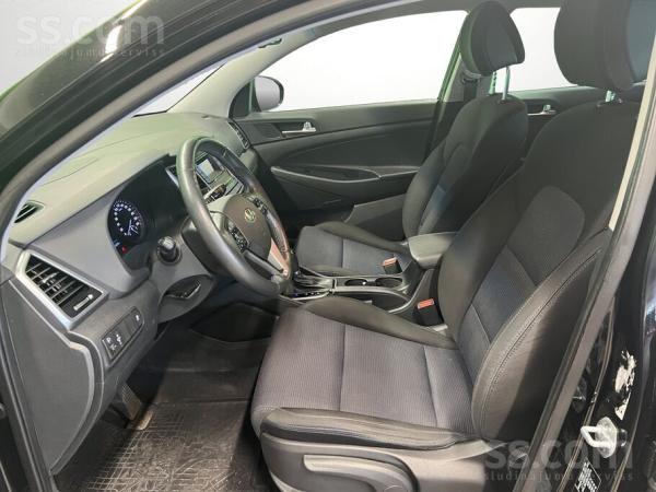 Black Hyundai Tucson 2016 in Riga, with an engine capacity of 1.70 L and mileage of 154 thousand km for 10990 €, photo 11 on AUTOMOTO.COM.LV