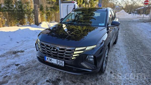 Black Hyundai Tucson 2021 in Riga, with an engine capacity of 1.60 L and mileage of 48 thousand km for 21600 €, photo 1 on AUTOMOTO.COM.LV
