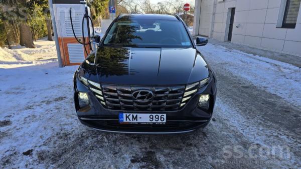 Black Hyundai Tucson 2021 in Riga, with an engine capacity of 1.60 L and mileage of 48 thousand km for 21600 €, photo 3 on AUTOMOTO.COM.LV
