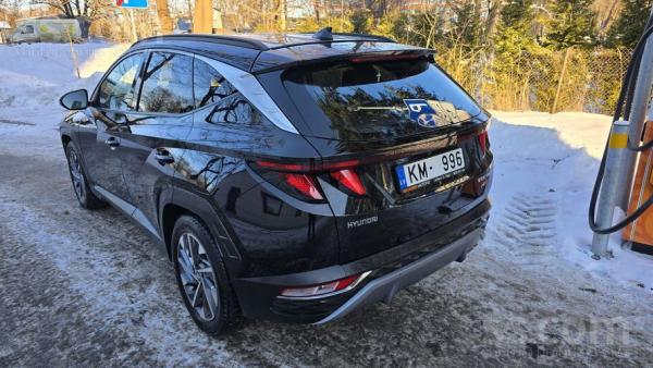 Black Hyundai Tucson 2021 in Riga, with an engine capacity of 1.60 L and mileage of 48 thousand km for 21600 €, photo 4 on AUTOMOTO.COM.LV