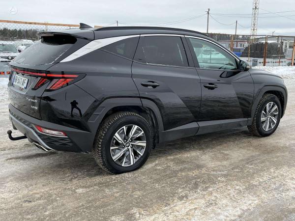 Black Hyundai Tucson 2021 in Vilnius, with an engine capacity of 1.60 L and mileage of 226 thousand km for 16577 €, photo 6 on AUTOMOTO.COM.LV