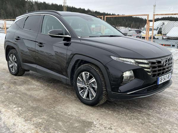 Black Hyundai Tucson 2021 in Vilnius, with an engine capacity of 1.60 L and mileage of 226 thousand km for 16577 €, photo 7 on AUTOMOTO.COM.LV