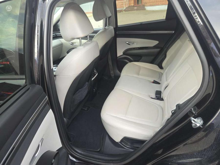 Melns Hyundai Tucson 2021 Marijampole, ar dzinēja tilpumu 1.60 L un nobraukumu 50 tūkst. km par 28900 €, foto 12 vietnē AUTOMOTO.COM.LV