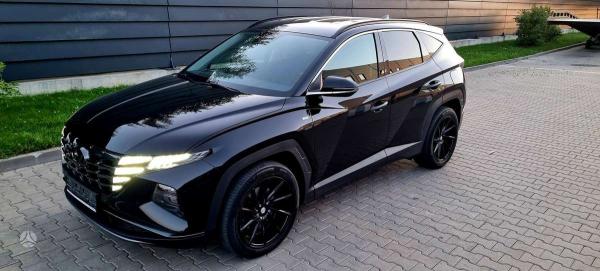 Black Hyundai Tucson 2021 in Vilnius, with an engine capacity of 1.60 L and mileage of 104 thousand km for 22350 €, photo 4 on AUTOMOTO.COM.LV