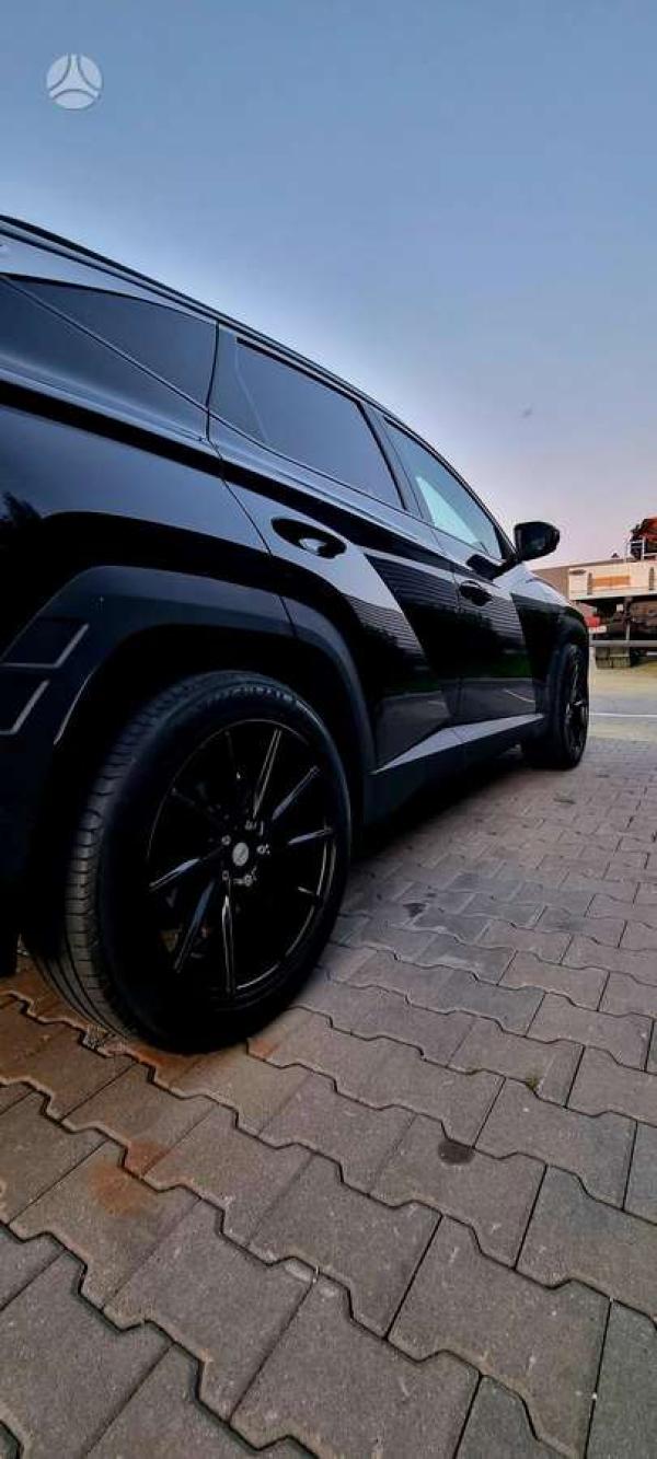 Black Hyundai Tucson 2021 in Vilnius, with an engine capacity of 1.60 L and mileage of 104 thousand km for 22350 €, photo 7 on AUTOMOTO.COM.LV