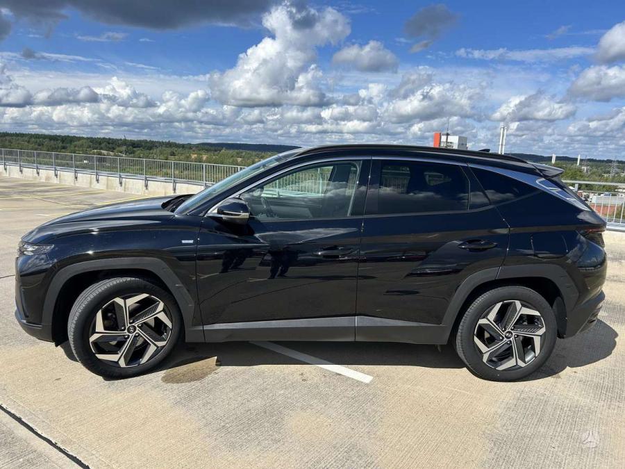 Black Hyundai Tucson 2021 in Vilnius, with an engine capacity of 1.60 L and mileage of 83 thousand km for 25400 €, photo 6 on AUTOMOTO.COM.LV