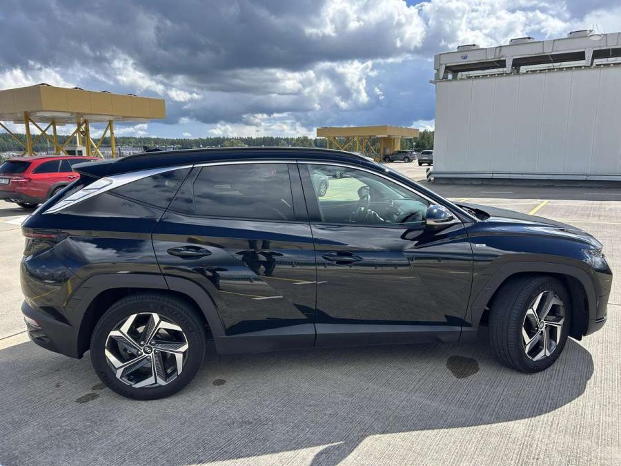 Black Hyundai Tucson 2021 in Vilnius, with an engine capacity of 1.60 L and mileage of 83 thousand km for 25400 €, photo 7 on AUTOMOTO.COM.LV