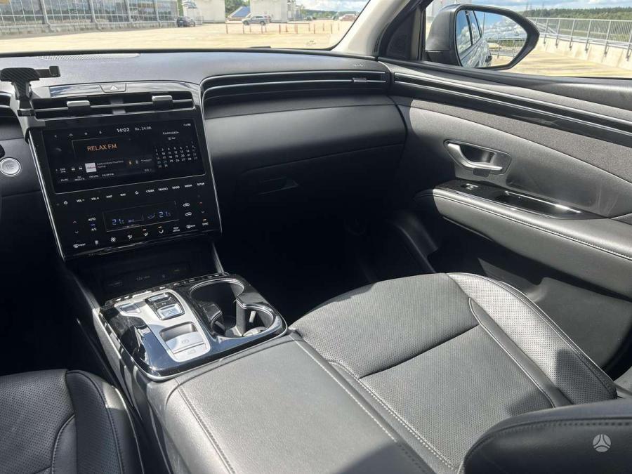 Black Hyundai Tucson 2021 in Vilnius, with an engine capacity of 1.60 L and mileage of 83 thousand km for 25400 €, photo 16 on AUTOMOTO.COM.LV