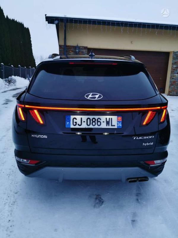 Black Hyundai Tucson 2022 in Kaunas, with an engine capacity of 1.60 L and mileage of 151 thousand km for 23900 €, photo 5 on AUTOMOTO.COM.LV