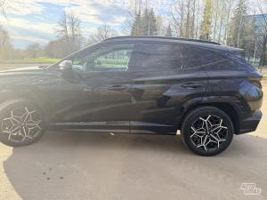 Black Hyundai Tucson 2022 in Panevezys, with an engine capacity of 1.60 L and mileage of 56 thousand km for 24800 €, photo 5 on AUTOMOTO.COM.LV
