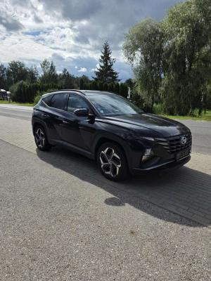 Black Hyundai Tucson 2022 in Elektrenai, with an engine capacity of 1.60 L and mileage of 153 thousand km for 21900 €, photo  on AUTOMOTO.COM.LV