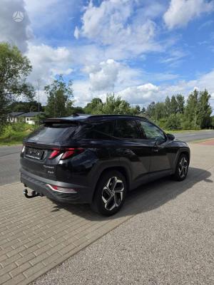Black Hyundai Tucson 2022 in Elektrenai, with an engine capacity of 1.60 L and mileage of 153 thousand km for 21900 €, photo 5 on AUTOMOTO.COM.LV