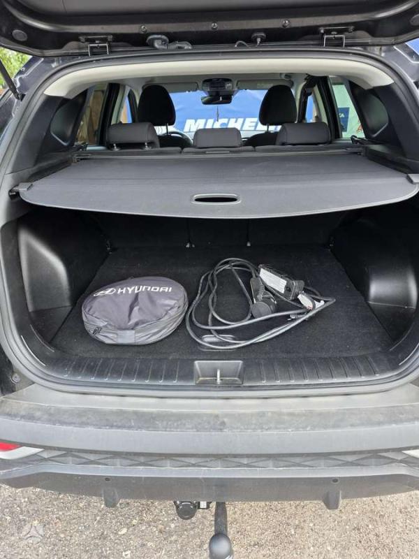 Black Hyundai Tucson 2022 in Elektrenai, with an engine capacity of 1.60 L and mileage of 153 thousand km for 21900 €, photo 10 on AUTOMOTO.COM.LV