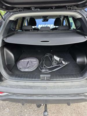 Black Hyundai Tucson 2022 in Elektrenai, with an engine capacity of 1.60 L and mileage of 153 thousand km for 21900 €, photo 11 on AUTOMOTO.COM.LV