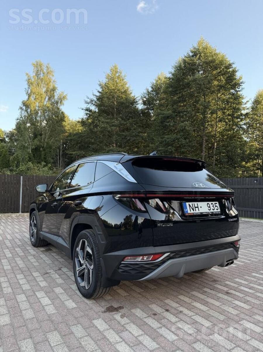 Black Hyundai Tucson 2022 in Riga, with an engine capacity of 1.60 L and mileage of 63 thousand km for 23000 €, photo 7 on AUTOMOTO.COM.LV
