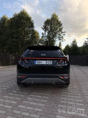 Black Hyundai Tucson 2022 in Riga, with an engine capacity of 1.60 L and mileage of 63 thousand km for 23000 €, photo 10 on AUTOMOTO.COM.LV