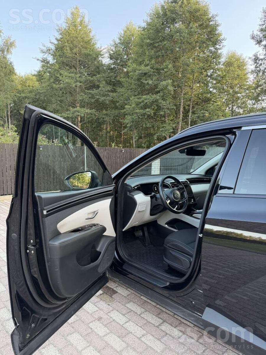 Black Hyundai Tucson 2022 in Riga, with an engine capacity of 1.60 L and mileage of 63 thousand km for 23000 €, photo 11 on AUTOMOTO.COM.LV