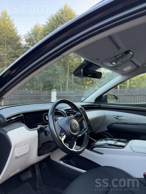 Black Hyundai Tucson 2022 in Riga, with an engine capacity of 1.60 L and mileage of 63 thousand km for 23000 €, photo 12 on AUTOMOTO.COM.LV