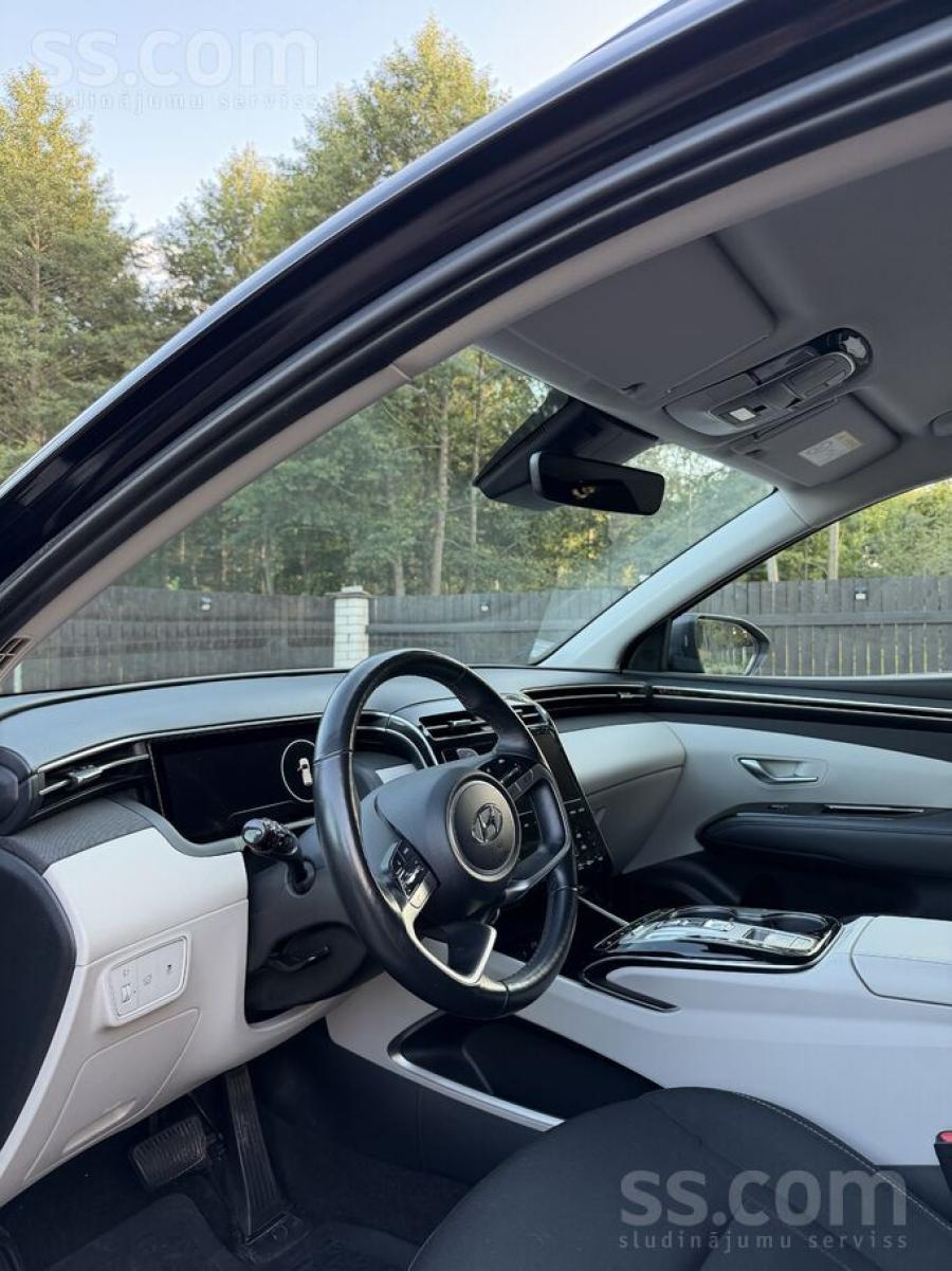 Black Hyundai Tucson 2022 in Riga, with an engine capacity of 1.60 L and mileage of 63 thousand km for 23000 €, photo 12 on AUTOMOTO.COM.LV