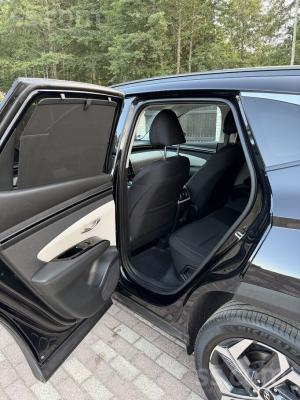 Black Hyundai Tucson 2022 in Riga, with an engine capacity of 1.60 L and mileage of 63 thousand km for 23000 €, photo 19 on AUTOMOTO.COM.LV