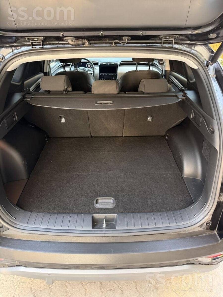 Black Hyundai Tucson 2022 in Riga, with an engine capacity of 1.60 L and mileage of 63 thousand km for 23000 €, photo 23 on AUTOMOTO.COM.LV