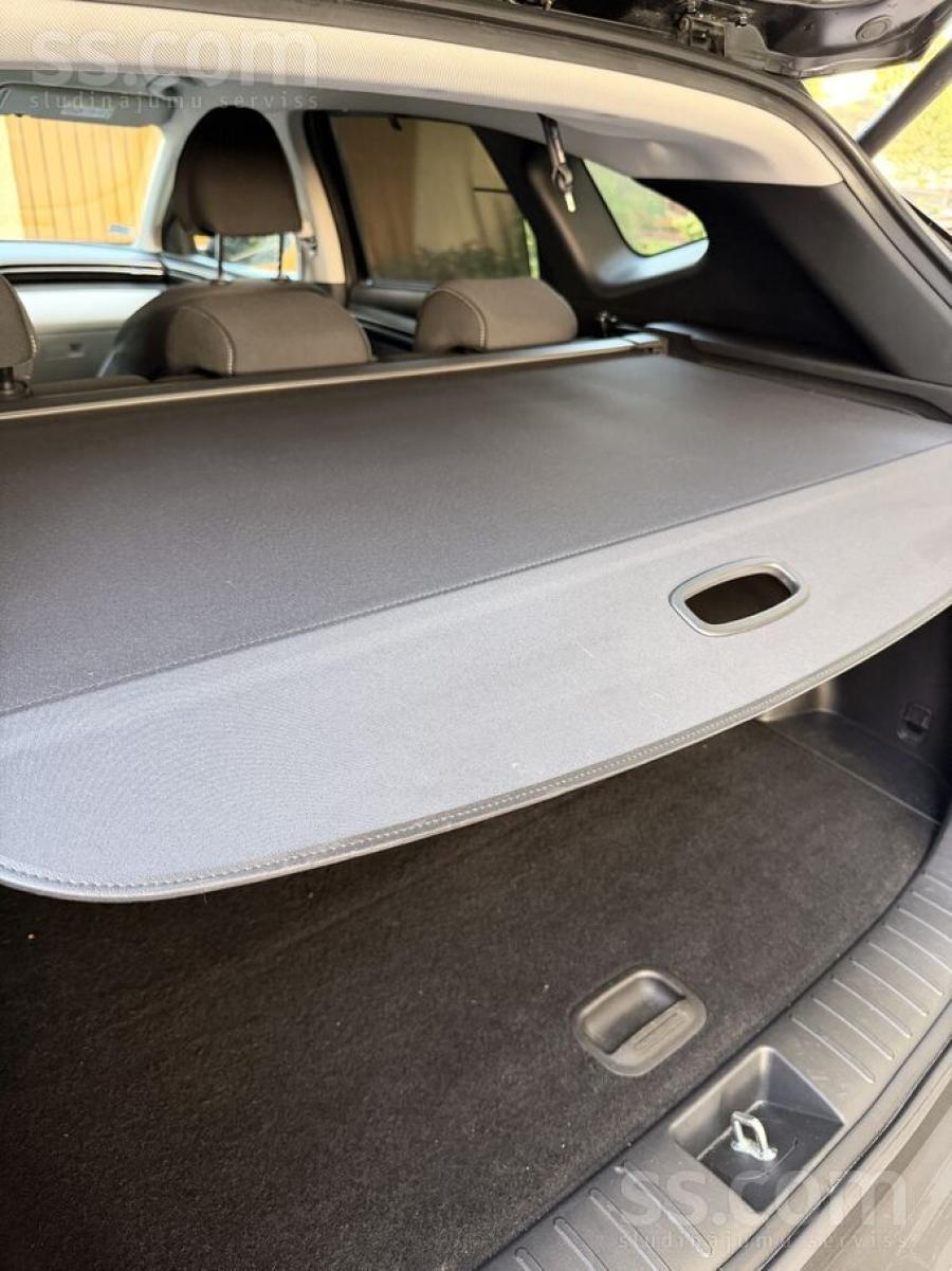 Black Hyundai Tucson 2022 in Riga, with an engine capacity of 1.60 L and mileage of 63 thousand km for 23000 €, photo 24 on AUTOMOTO.COM.LV