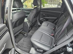 Black Hyundai Tucson 2023 in Riga, with an engine capacity of 2.50 L and mileage of 30 thousand km for 25500 €, photo 6 on AUTOMOTO.COM.LV